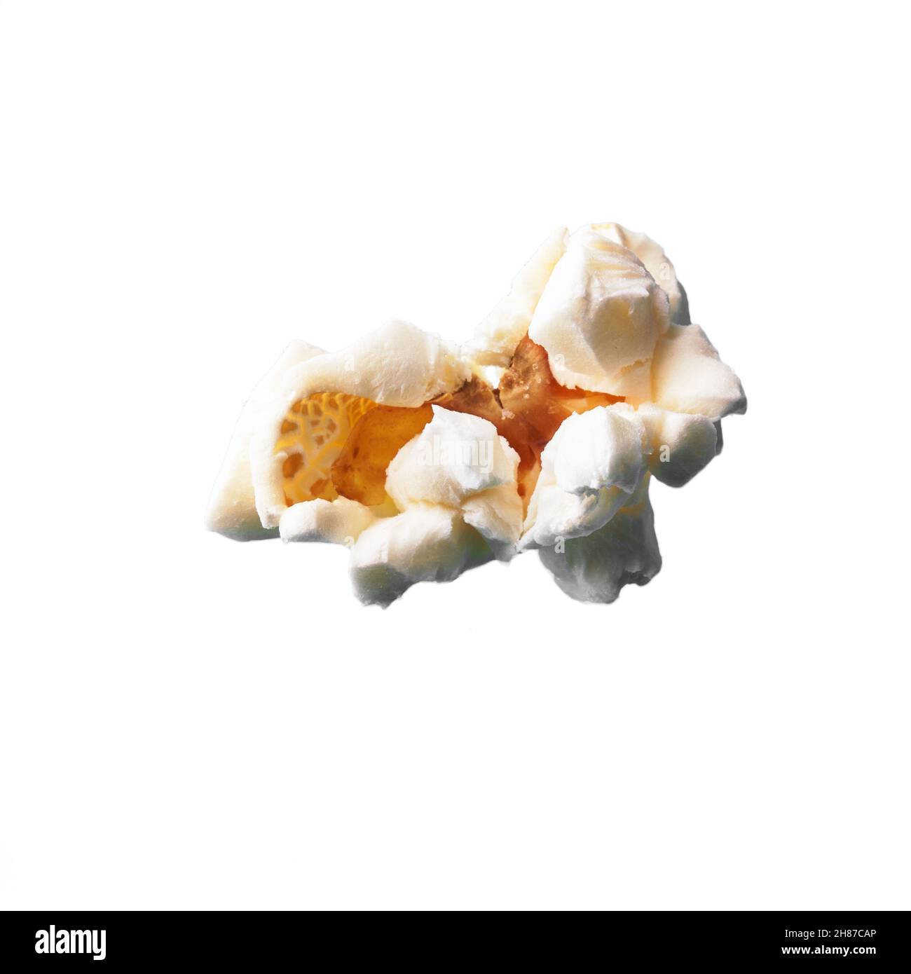 Single delicious salty popcorn isolated on a white background Stock ...