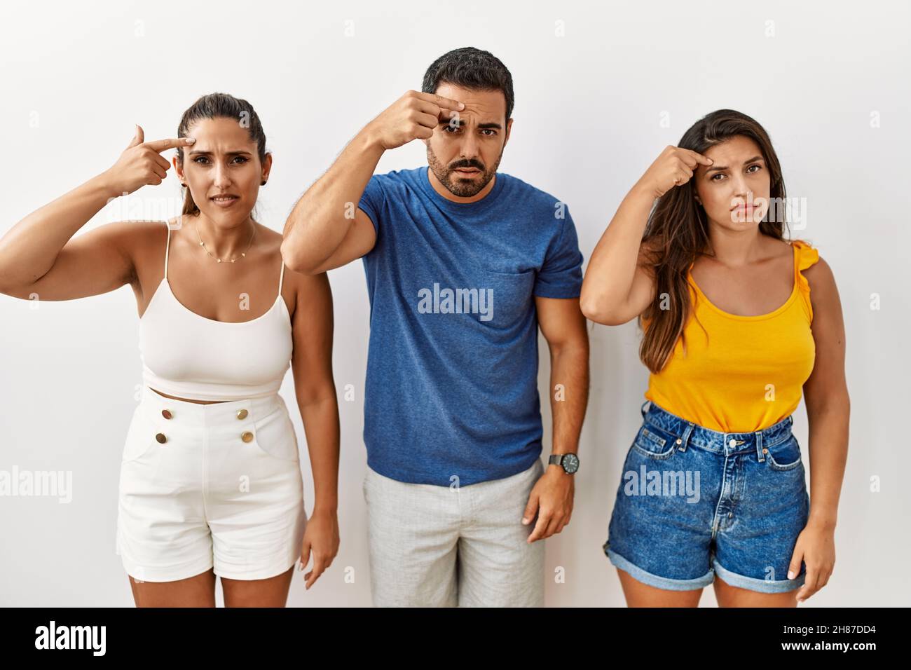 Group of young hispanic people standing over isolated background ...
