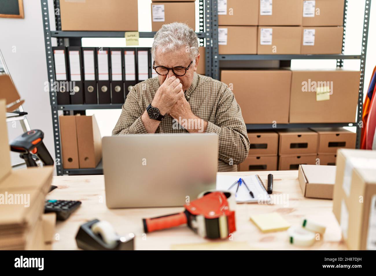 Senior caucasian man working at small business ecommerce with laptop ...