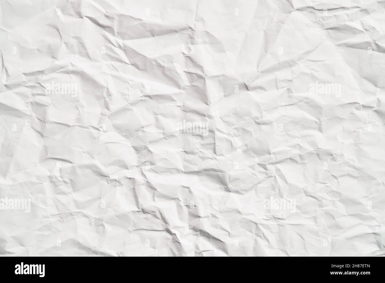 White crumpled paper texture with wrinkles. Damaged and torn sheet ...