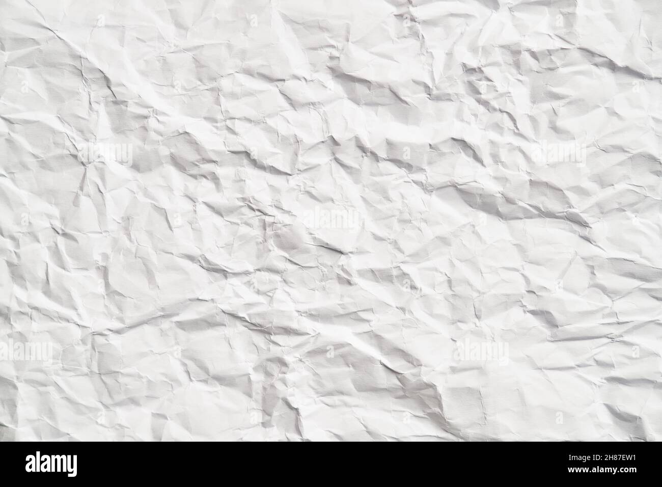 White crumpled paper texture with wrinkles. Damaged and torn sheet ...