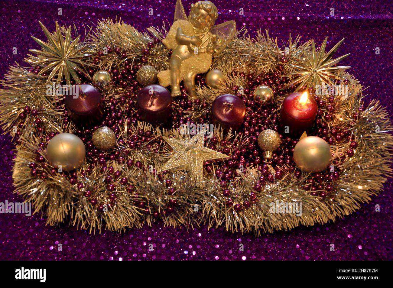 First sunday in advent concept xmas light violet background with ...