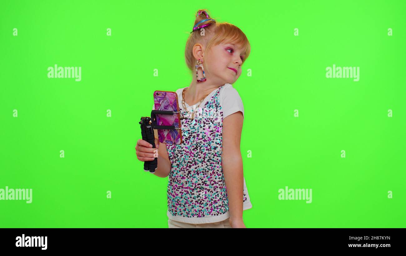 Dancing young little kid girl blogger record dance moves at camera for ...