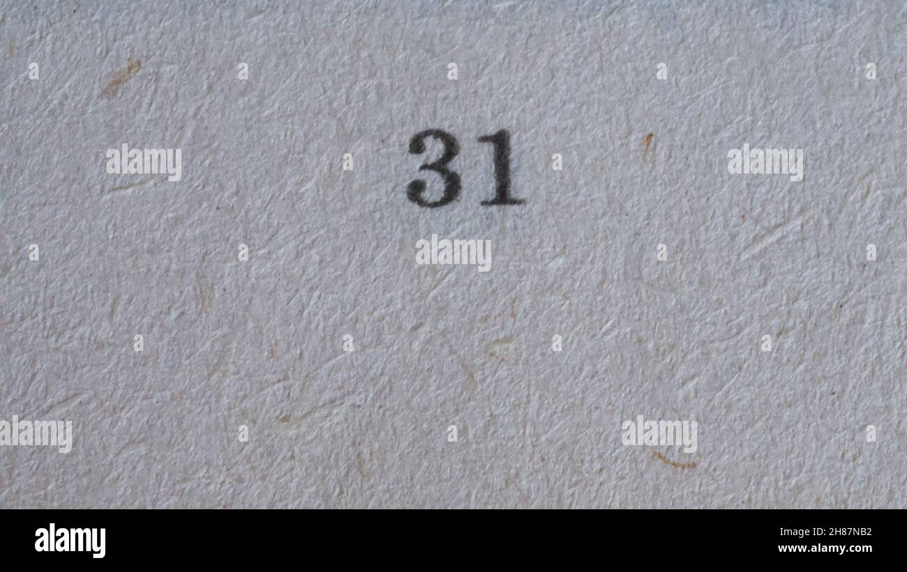 The number 31 printed on a piece of paper. Paper texture Stock Photo ...