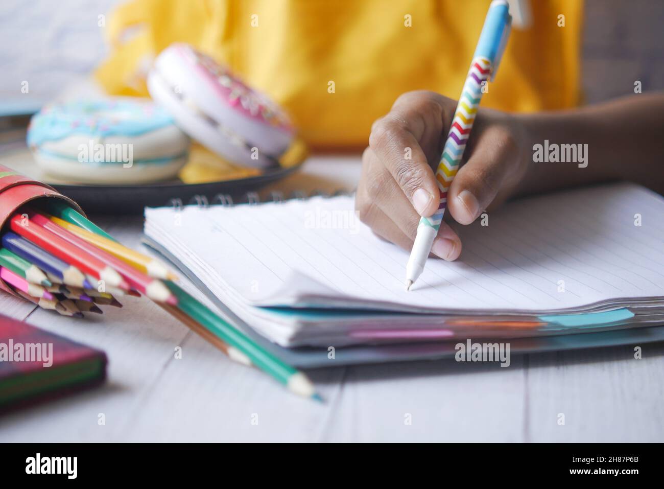 Kid writing diary hi-res stock photography and images - Alamy