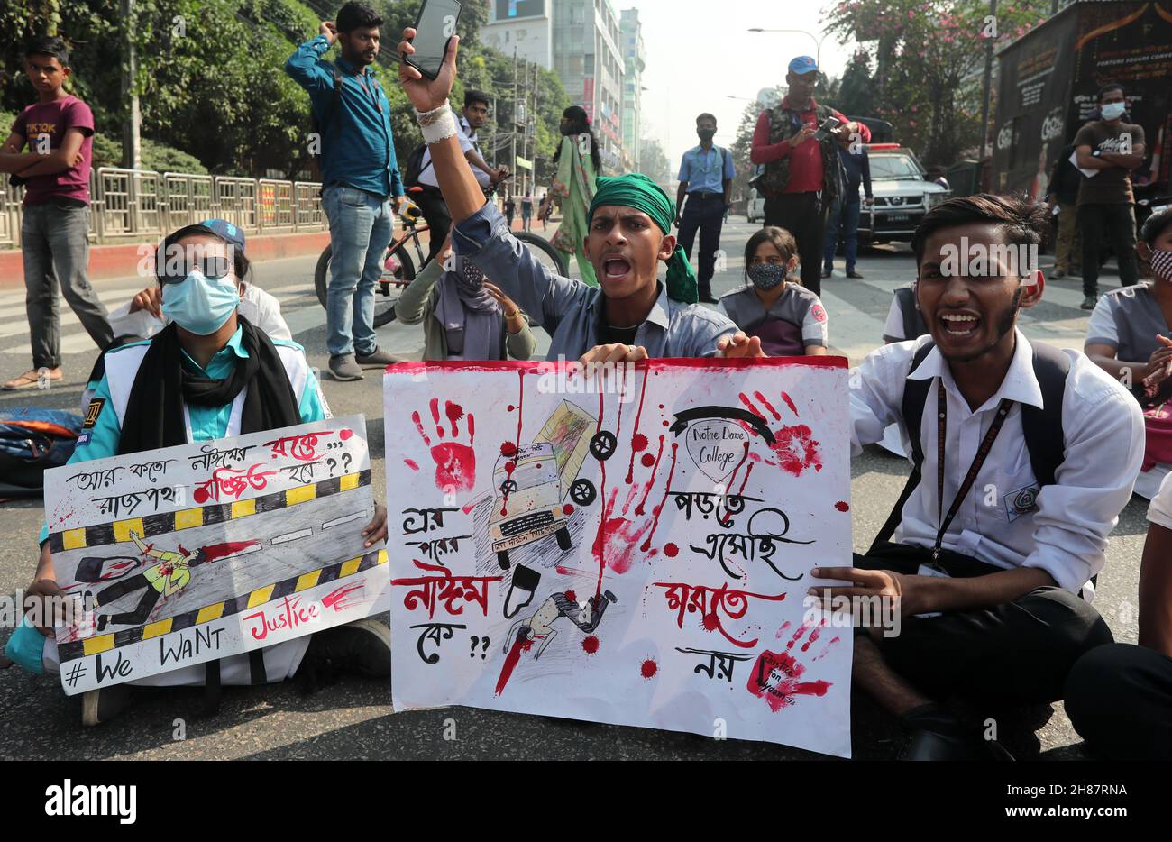 Student protests safe The roads Students demanding safe roads wave the ...