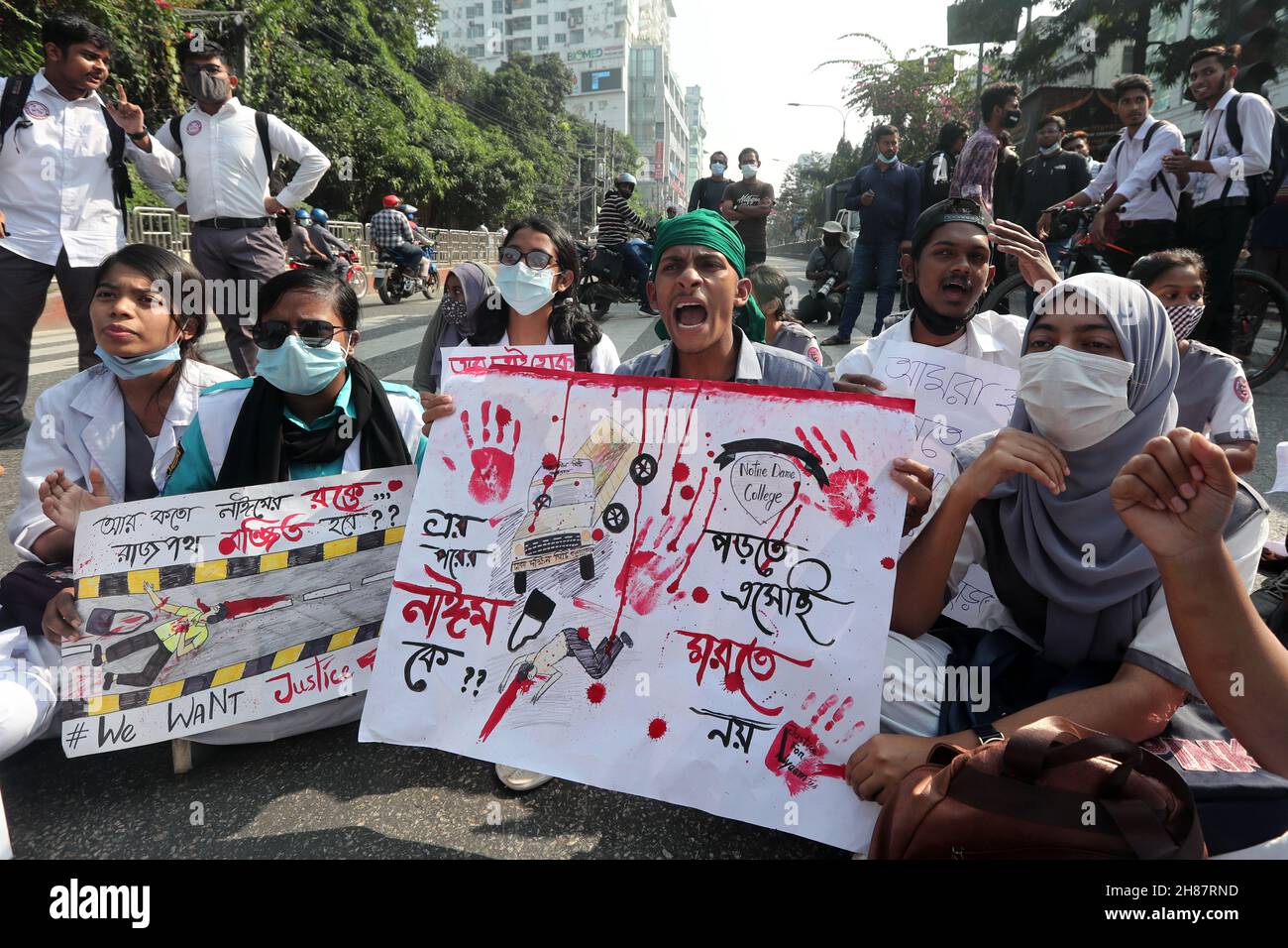 Student protests safe The roads Students demanding safe roads wave the ...