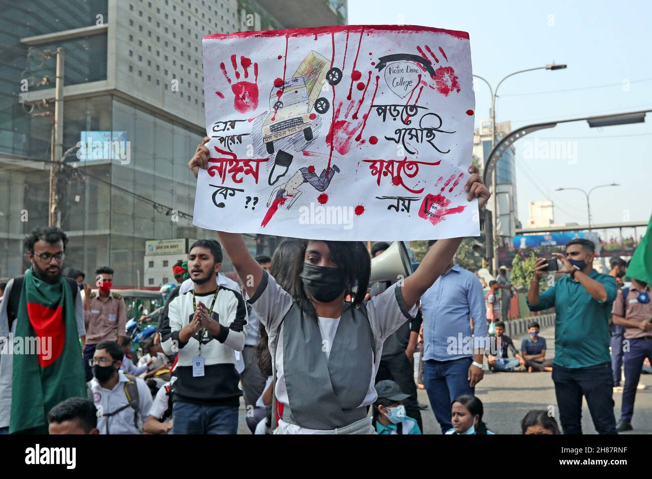 Student protests safe The roads Students demanding safe roads wave the ...