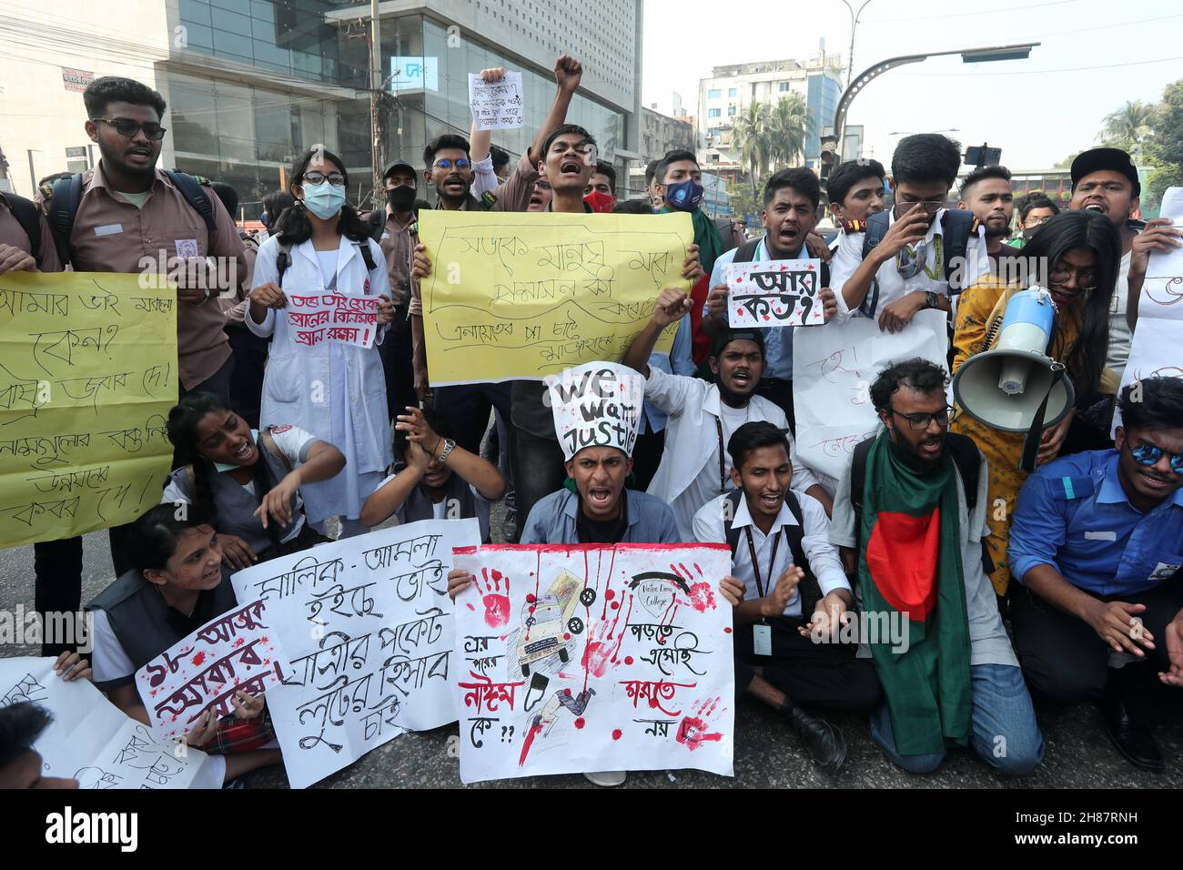Student protests safe The roads Students demanding safe roads wave the ...