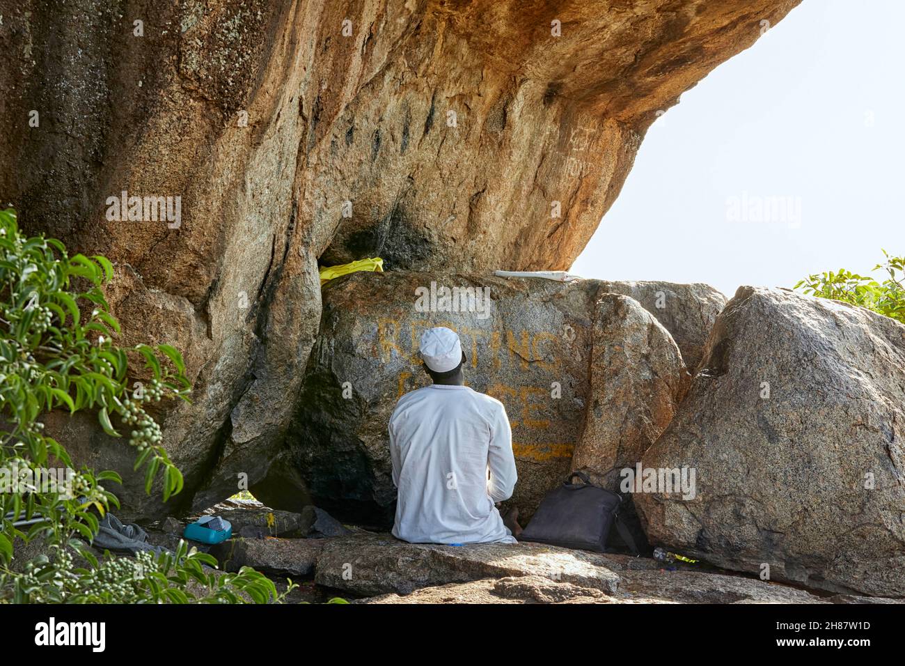 Pilgrim at Kit Mikayi Kitmikayi Kitmikaye rock formation in Kenya ...