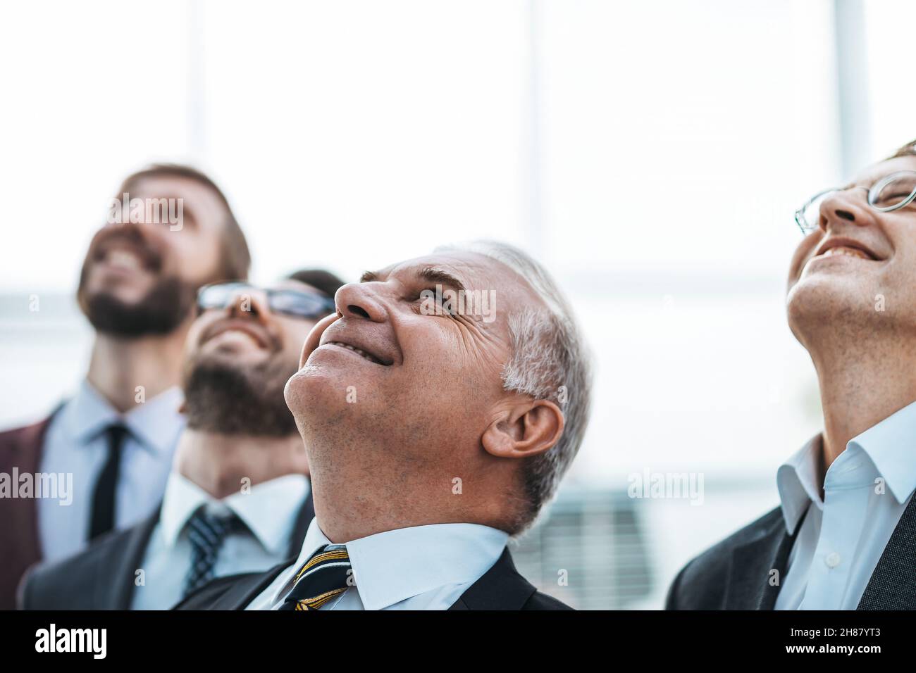 Business looking up happy hi-res stock photography and images - Alamy