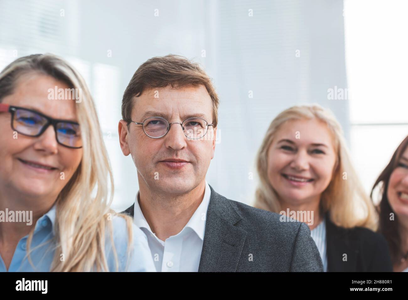 Group successful employees standing hi-res stock photography and images ...