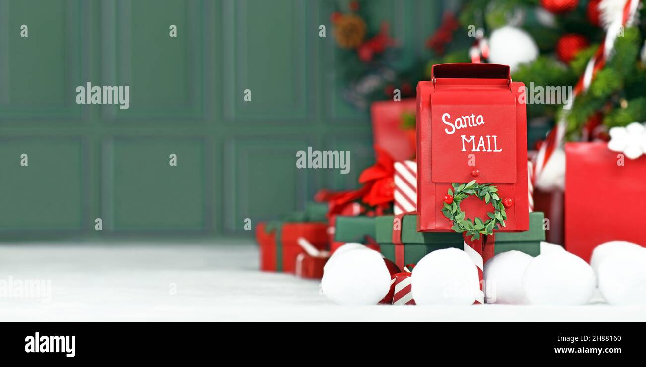 Christmas banner with red santa mail box in front of tree with green ...