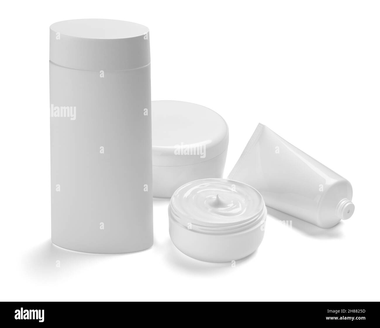 close up of a white beauty cream container and tube on white background ...