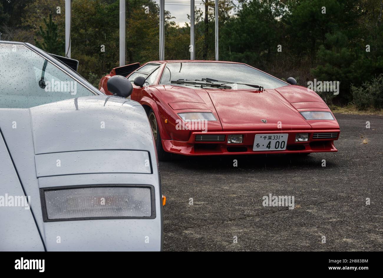 Two Lamborghini Countach sports cars. Silver LP400 and red LP400S ...