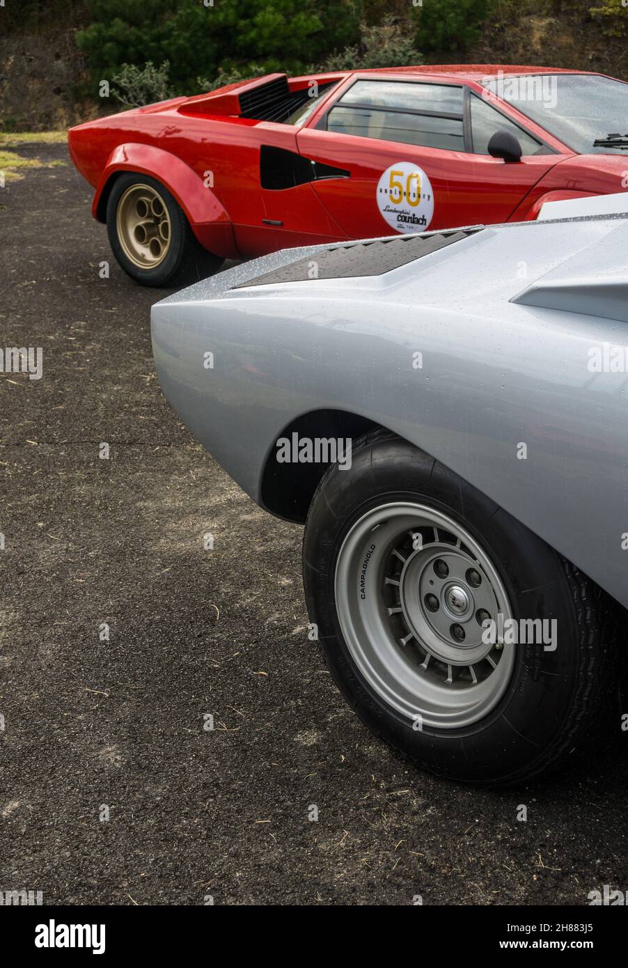 Two Lamborghini Countach sports cars. Silver LP400 and red LP400S ...
