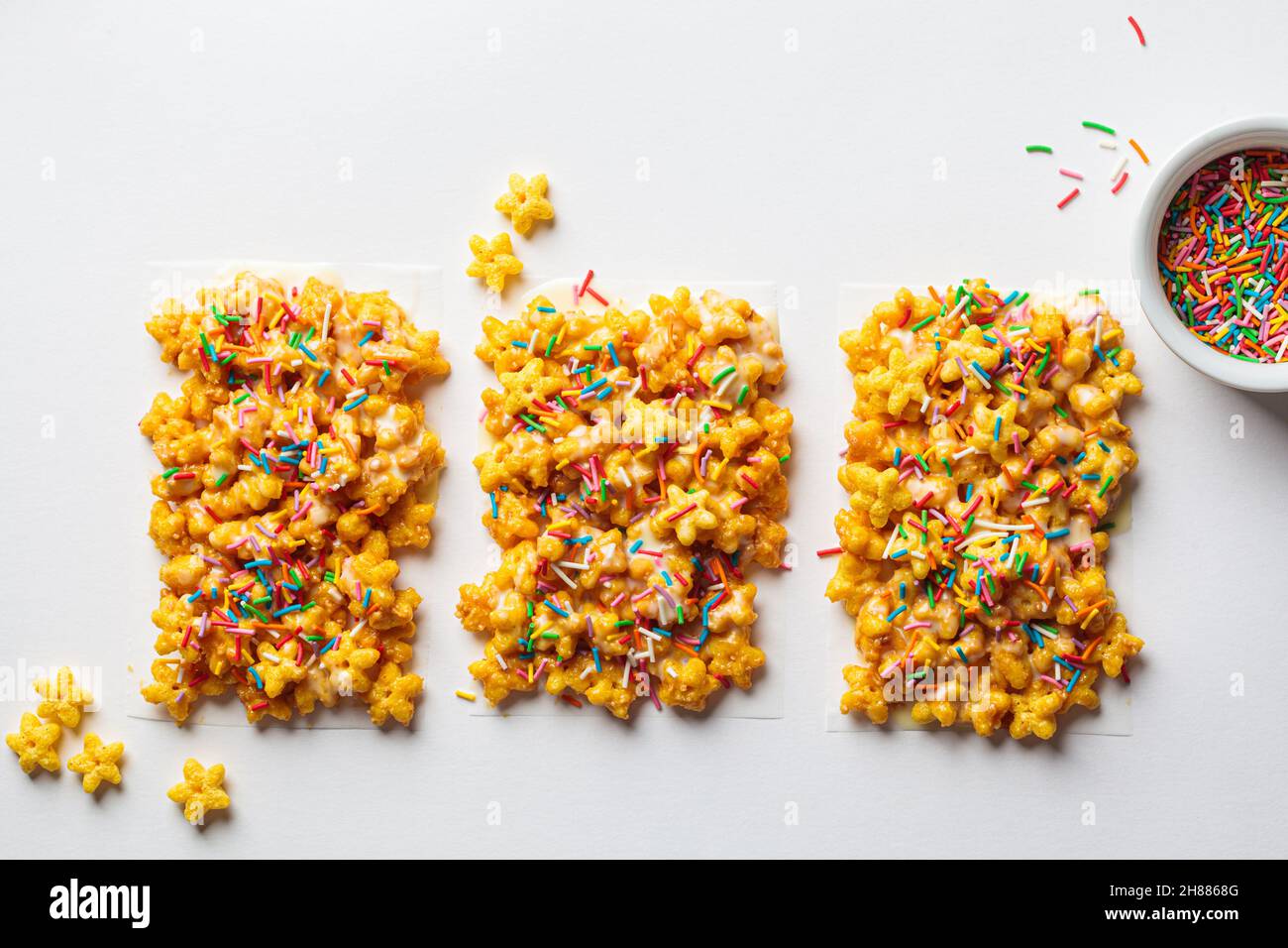 Children's corn stars cereal bars with colored sprinkles and white ...