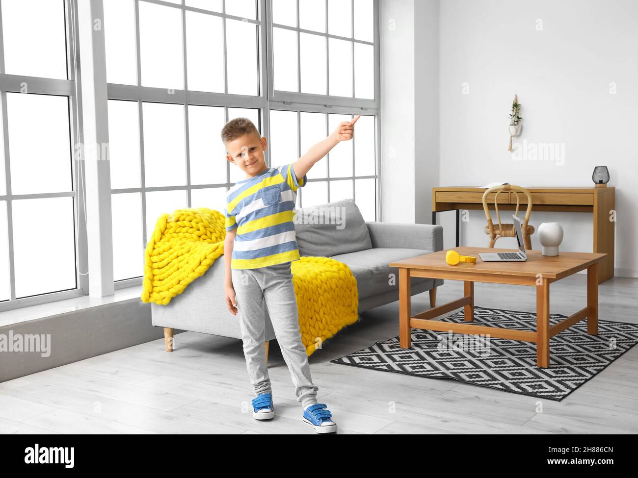 Cute little boy dancing at home Stock Photo - Alamy