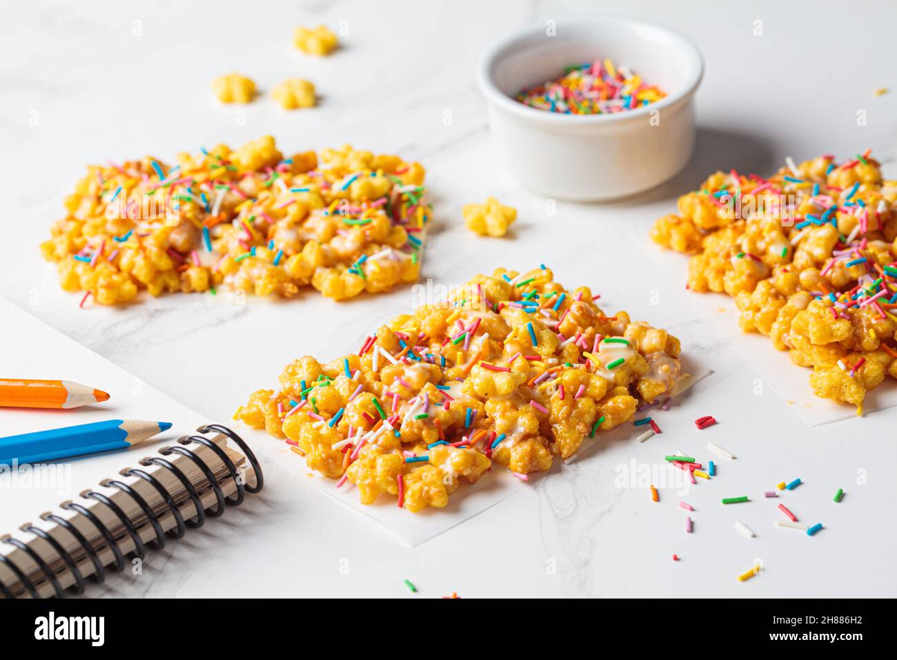 Children's corn stars cereal bars with colored sprinkles and white ...