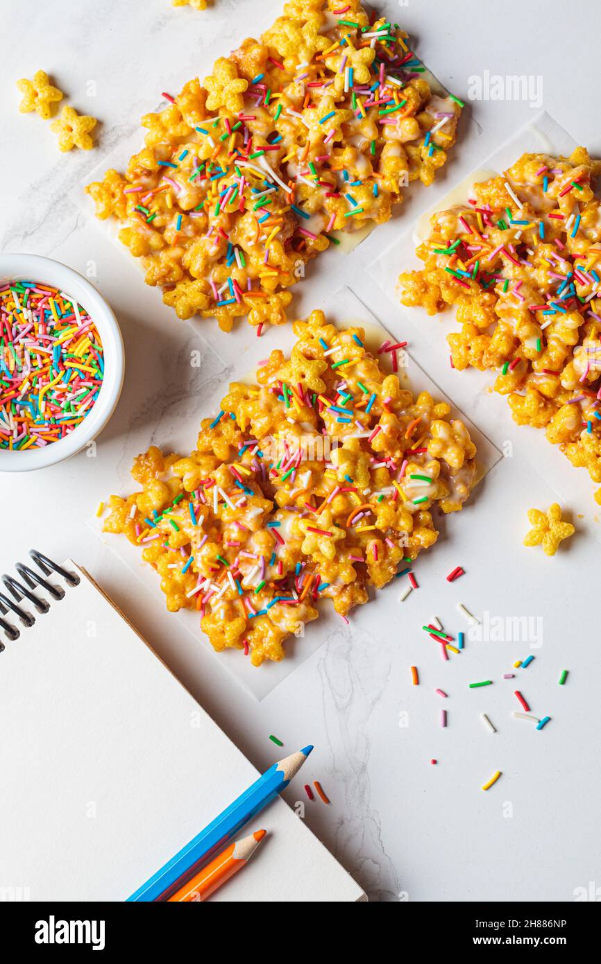 Children's corn stars cereal bars with colored sprinkles and white ...