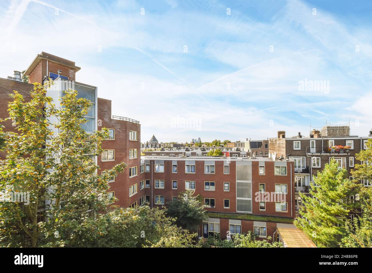 House surrounded by tall buildings hi-res stock photography and images ...