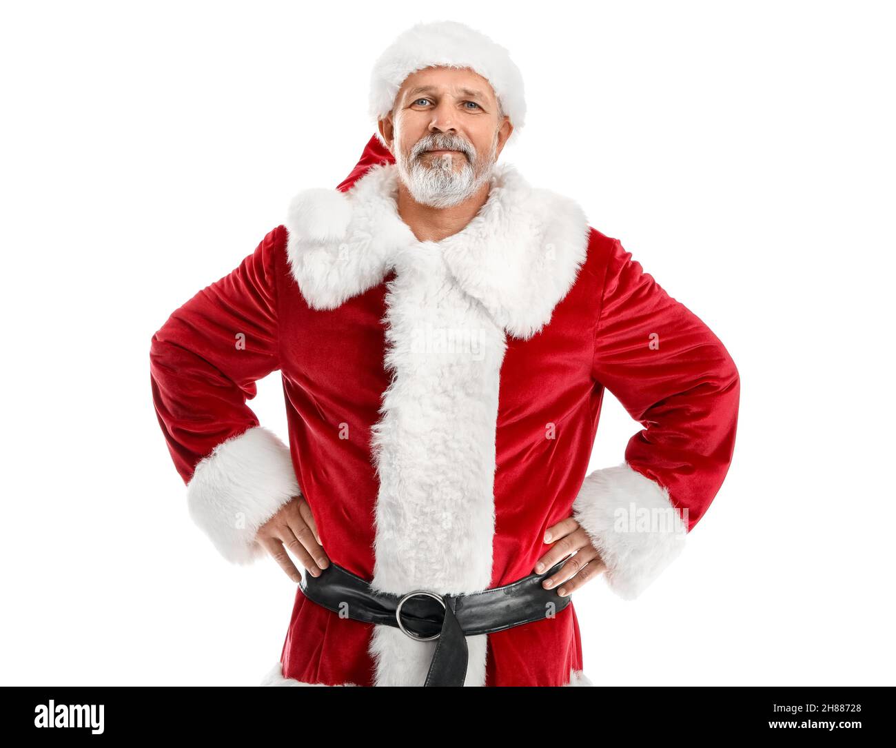 Santa Claus standing with hands on waist on white background Stock ...