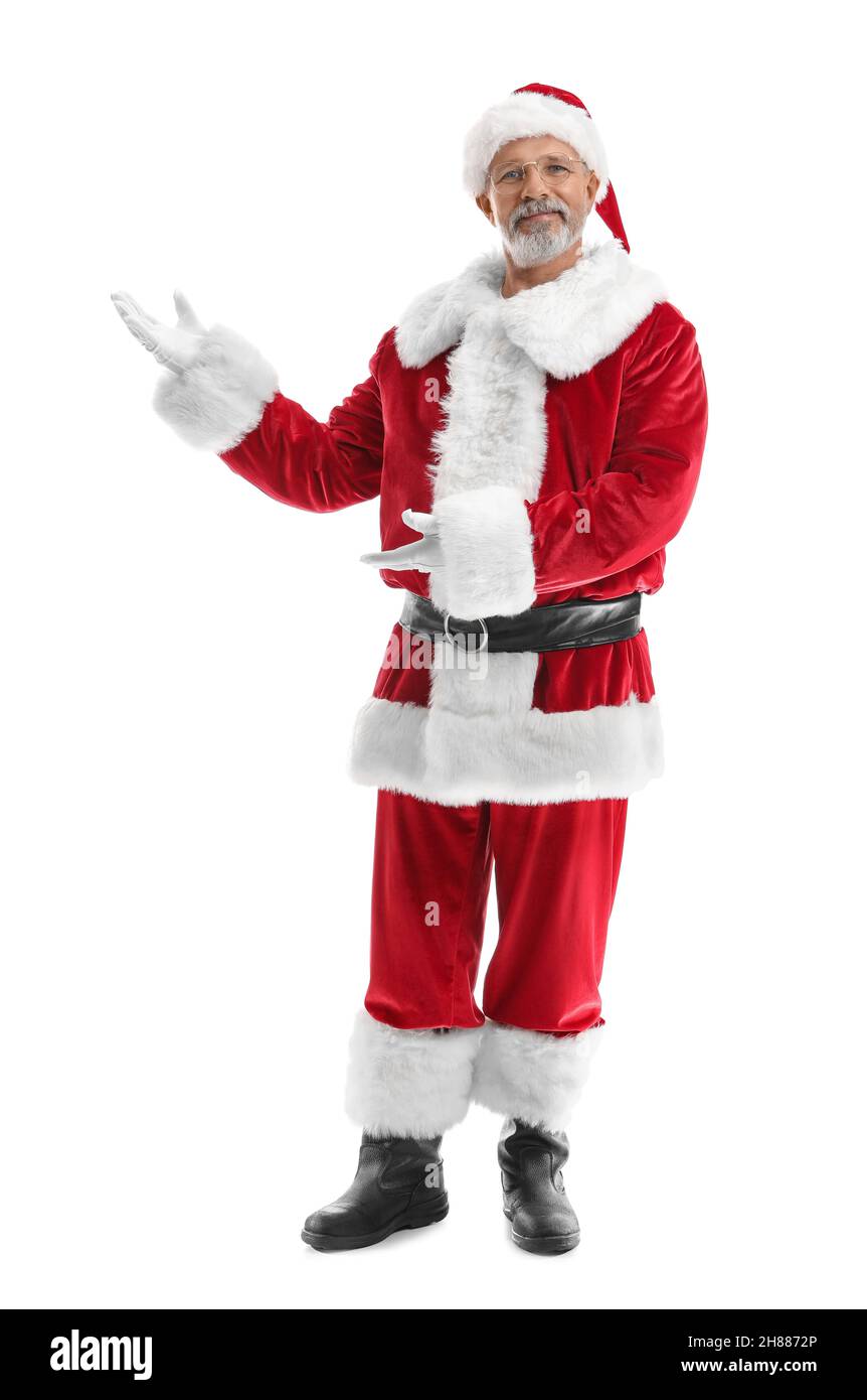 Santa Claus pointing at something on white background Stock Photo - Alamy