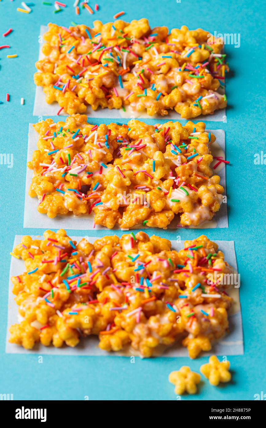 Children's corn stars cereal bars with colored sprinkles and white ...