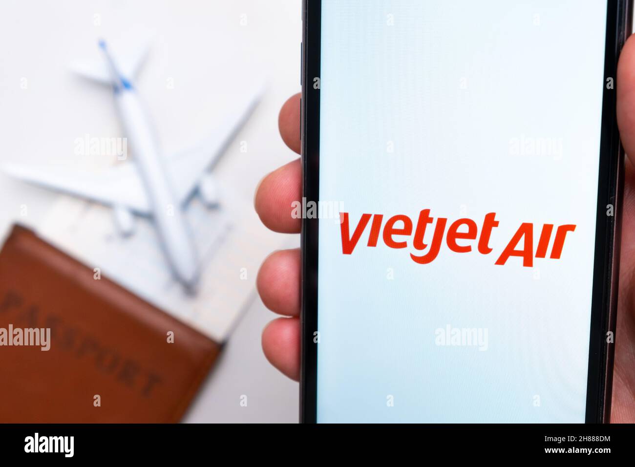 VietJet Air Airline app on a smartphone screen with a plane and ...