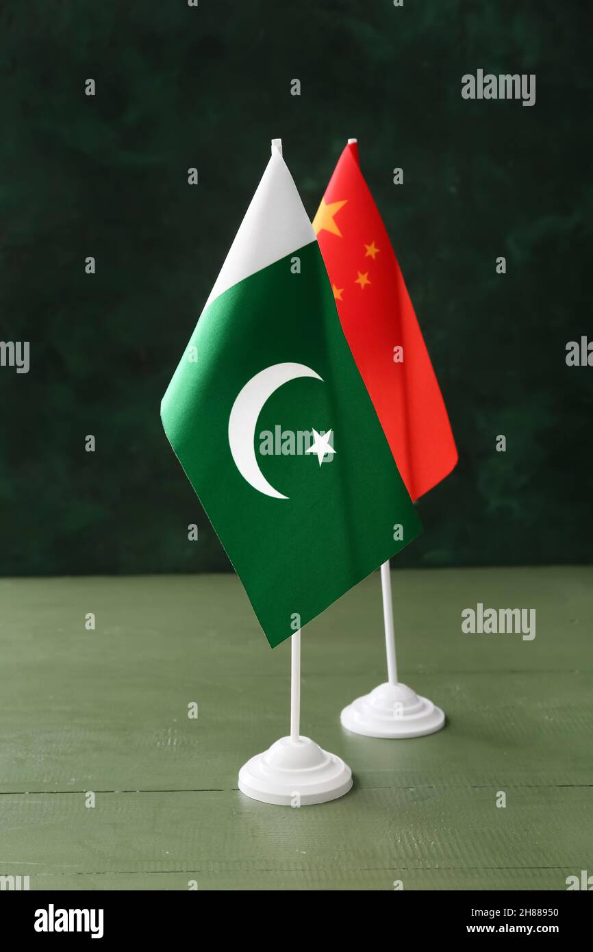 Flags of China and Pakistan on green background Stock Photo - Alamy