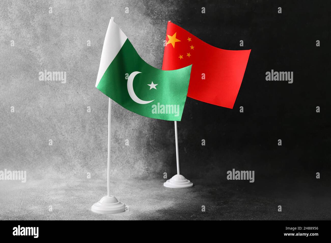 Flags of China and Pakistan on grunge background Stock Photo - Alamy