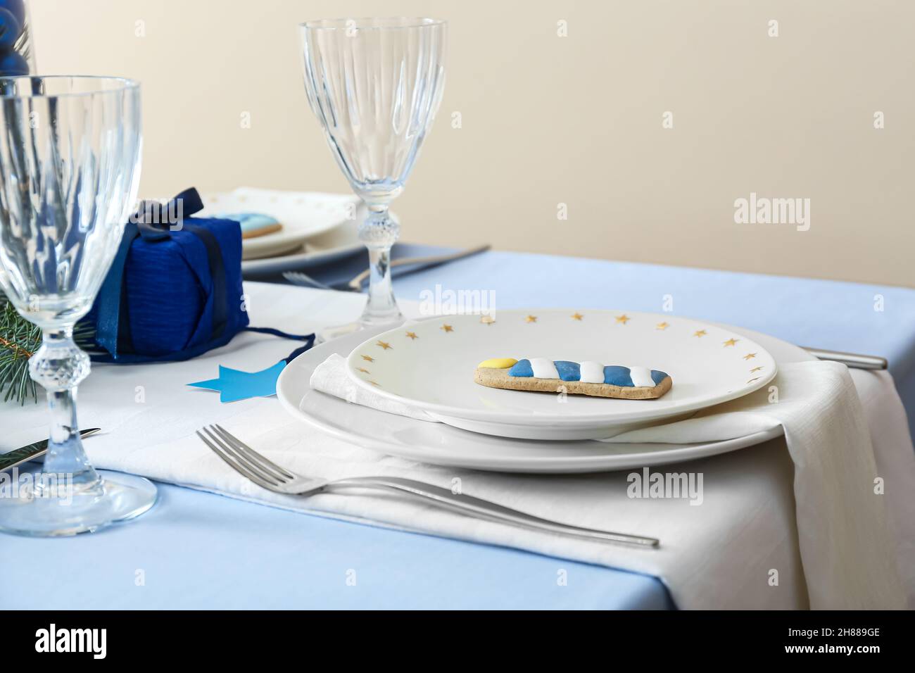 Beautiful table setting for Hanukkah celebration in dining room Stock ...