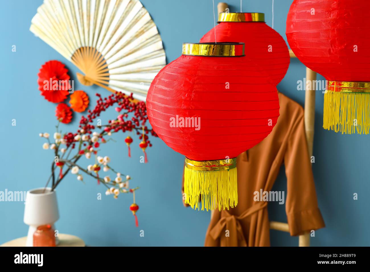 Beautiful Chinese lanterns in interior of modern room Stock Photo - Alamy