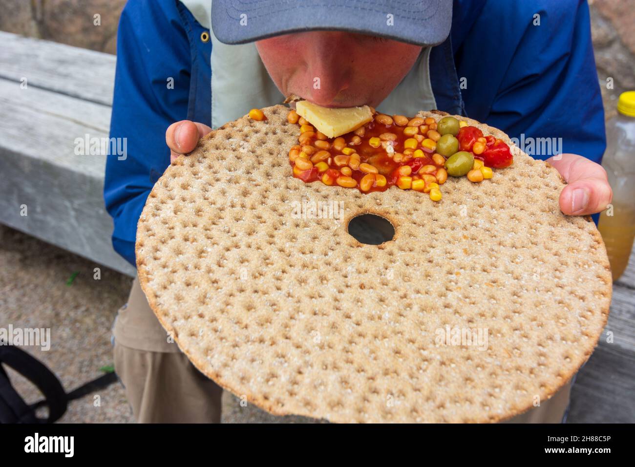 Young man eating beans model hi-res stock photography and images - Alamy