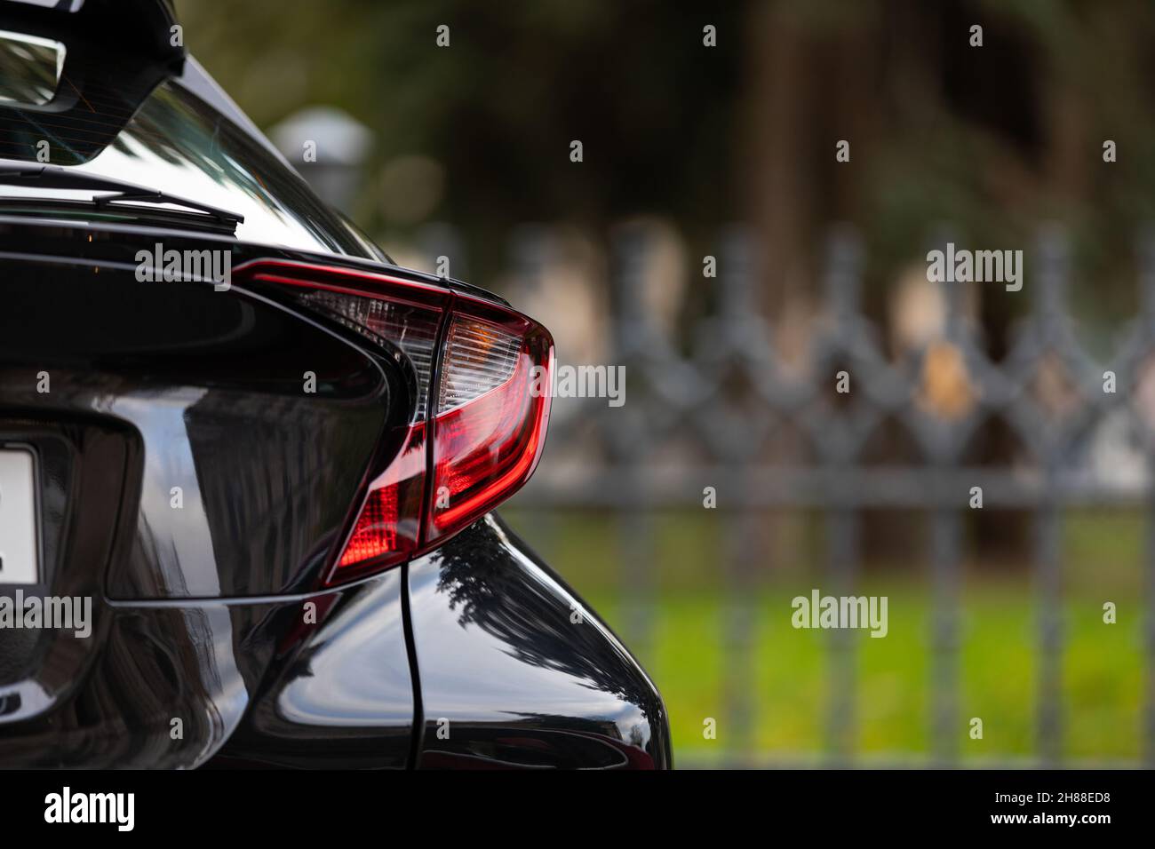 Close up picture of shiny modern car in the parking space in city ...