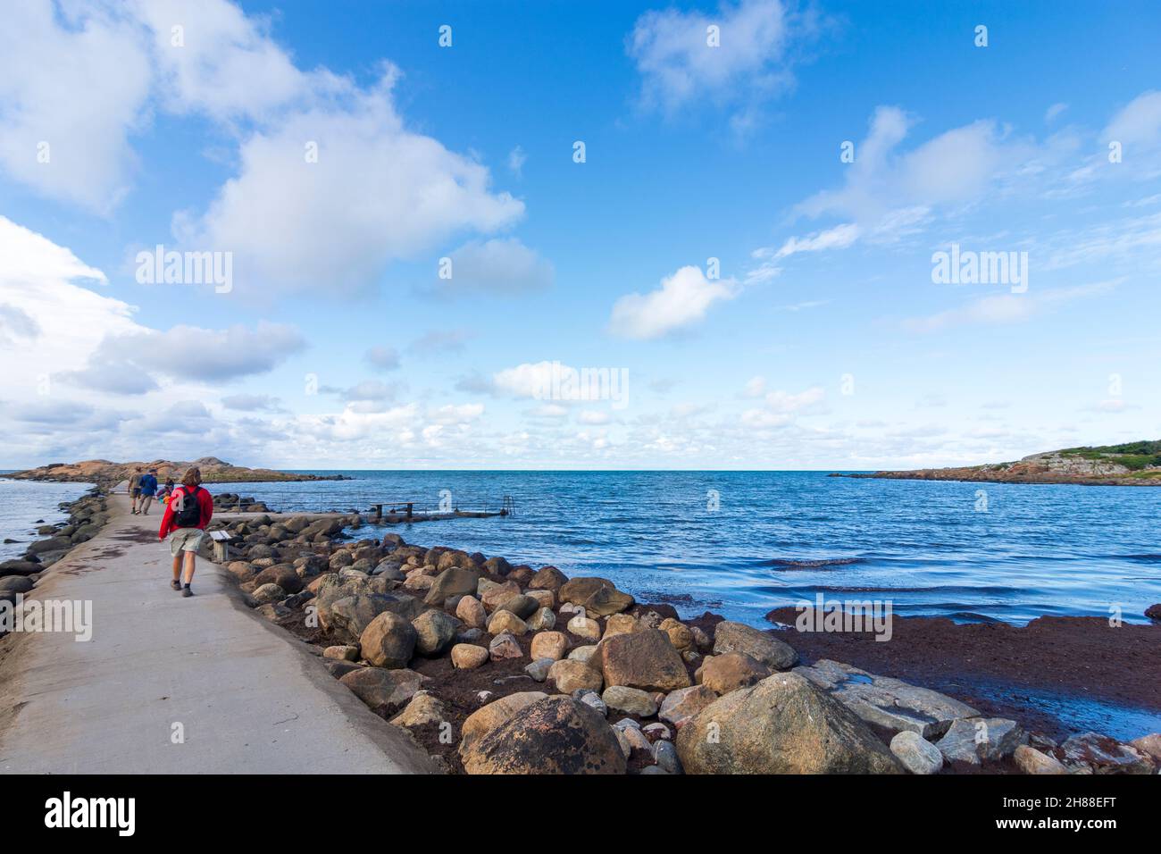 Causeway to a rock island in steningestrand hi-res stock photography ...