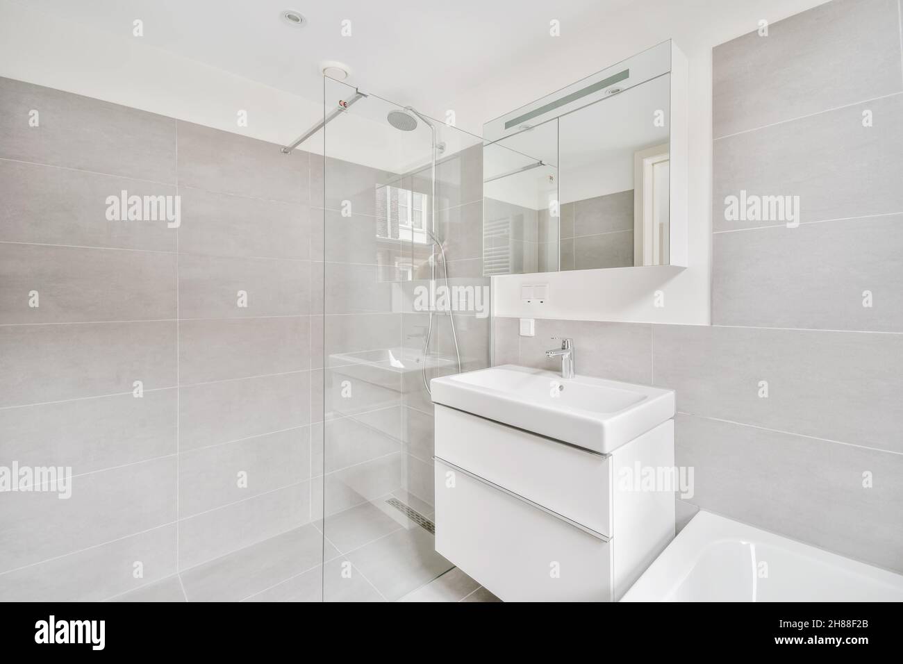 Interior design of a simple modern bathroom Stock Photo - Alamy