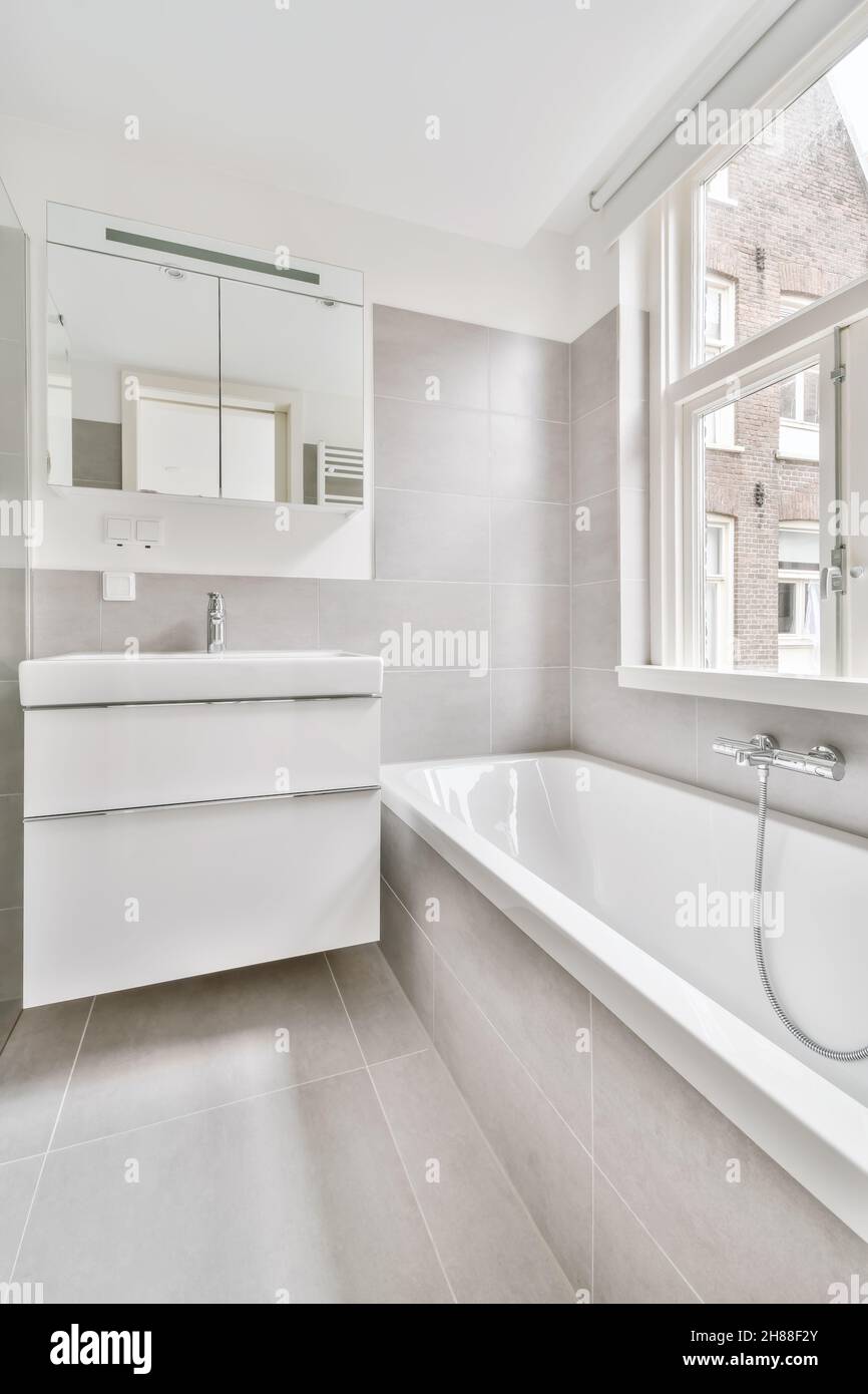 Interior design of a simple modern bathroom Stock Photo - Alamy