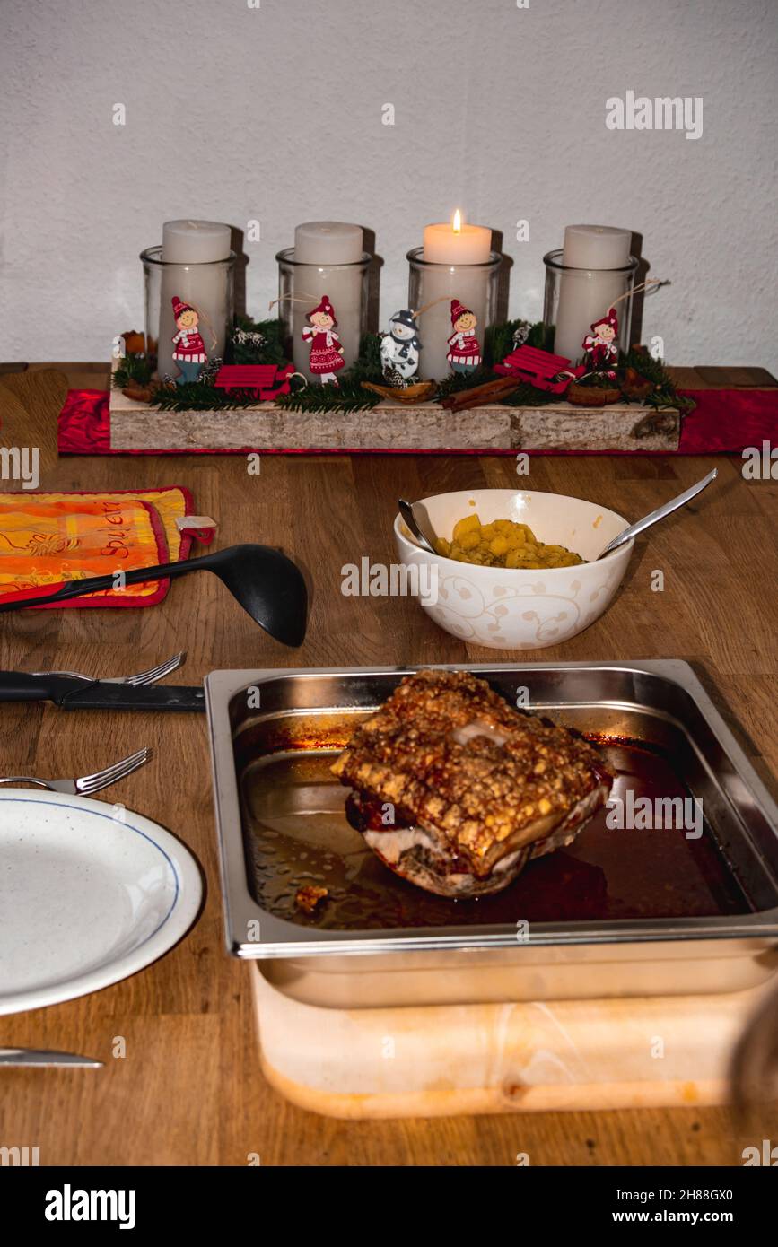 Lunch stands on a table with the first advent candle lit Stock Photo ...