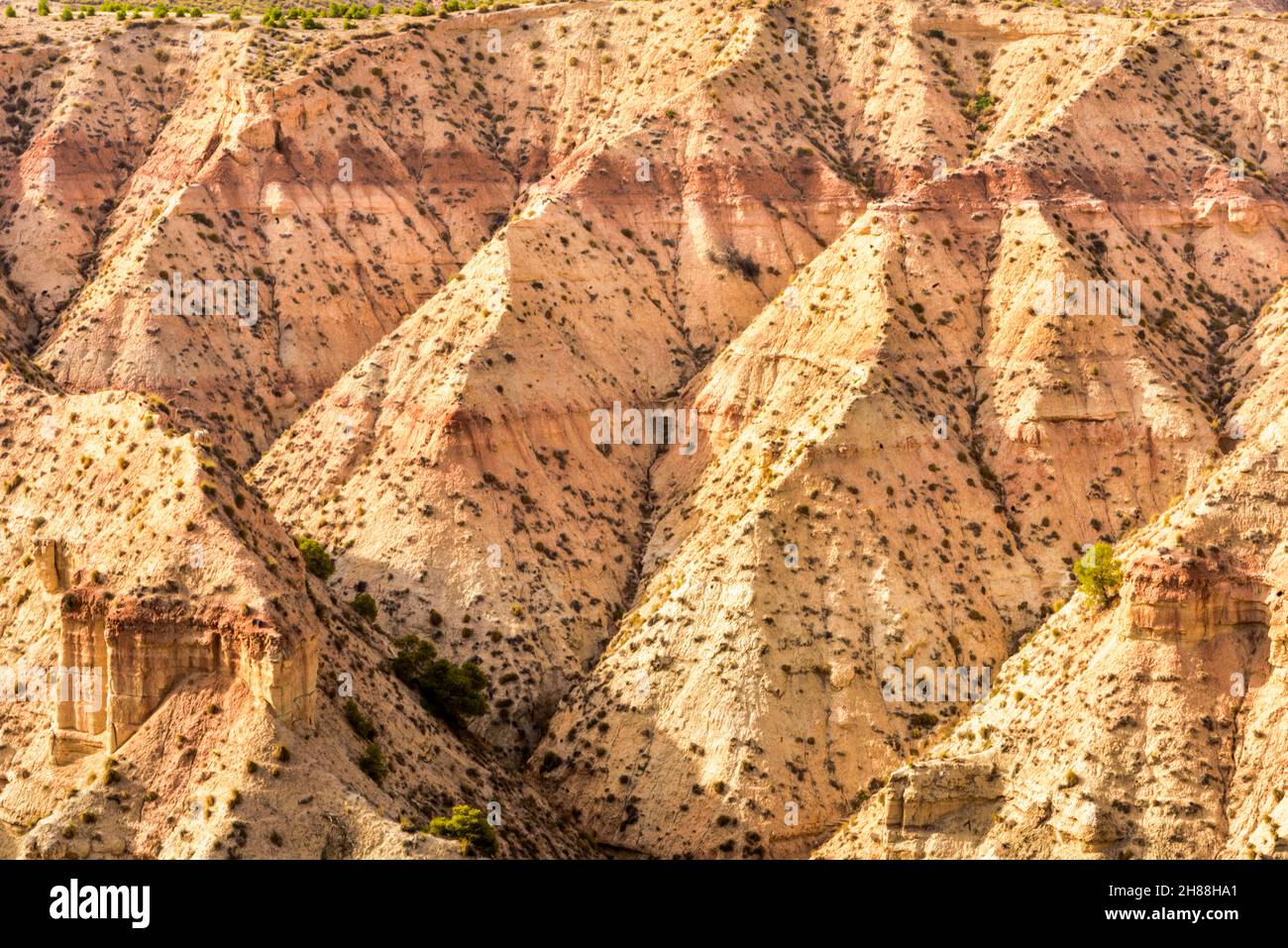 Striped hill formation in the Badlands of Gorafe desert, Andalucia ...