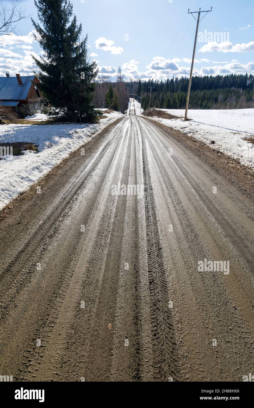 Thawing ground frost makes dirt roads wet and muddy at Spring , Finland ...