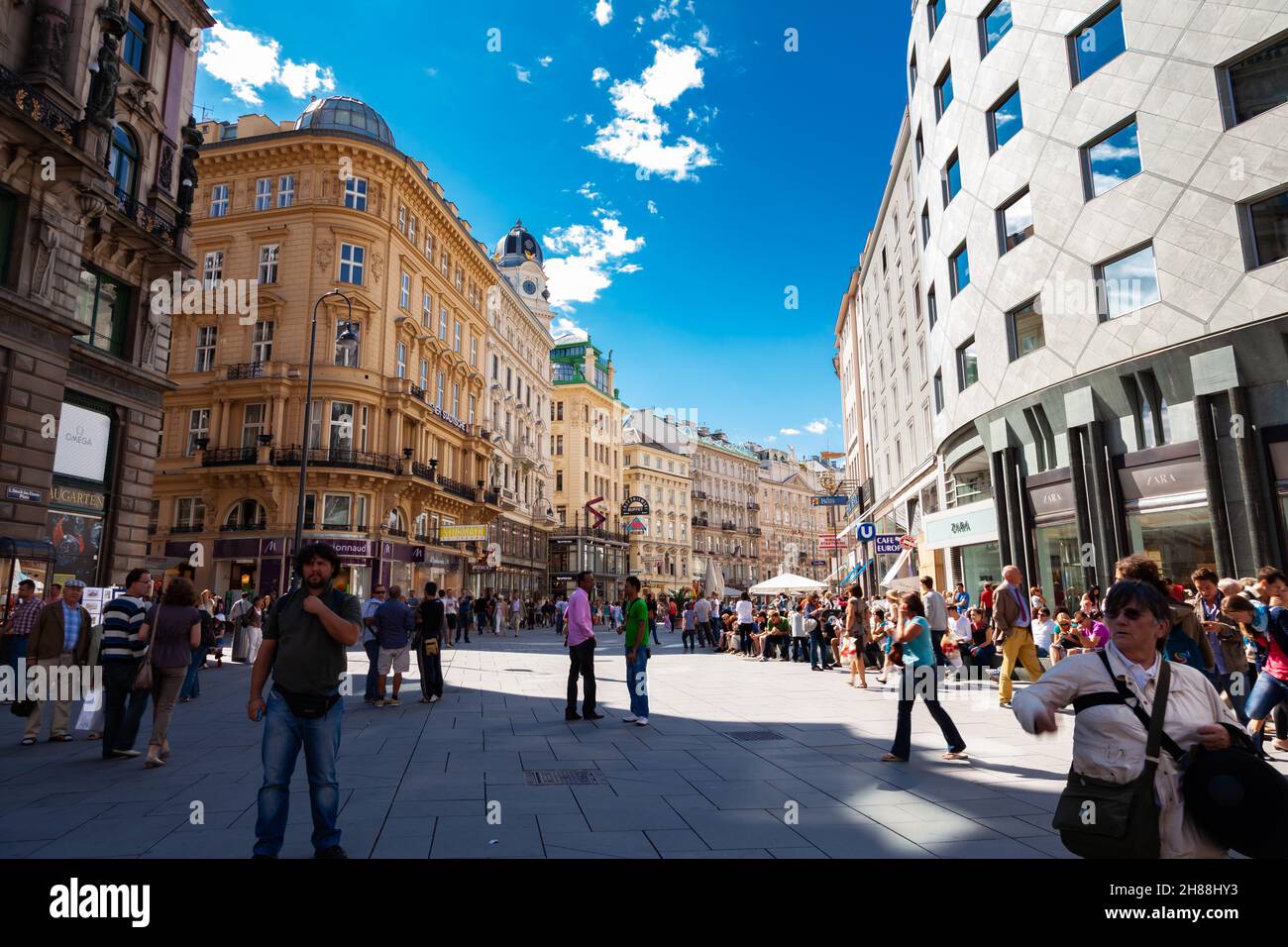 Vienna, Austria - August 9, 2011 : View of people walking, eating and ...