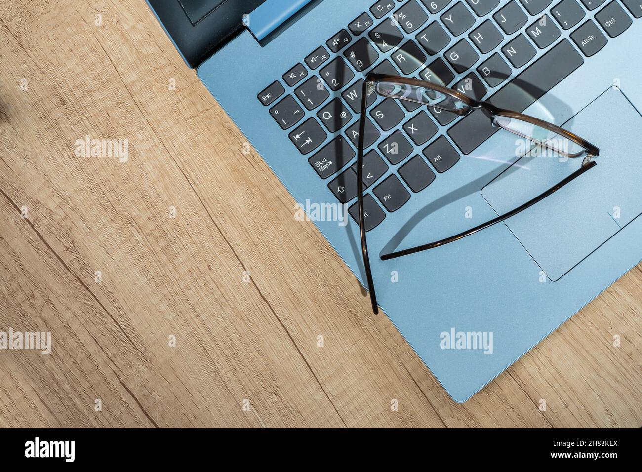 Glasses laptop open book text hi-res stock photography and images - Alamy