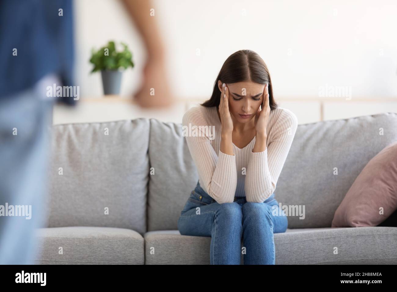 Sad Unhappy Millennial Caucasian Wife Afraid Of Her Angry Aggressive