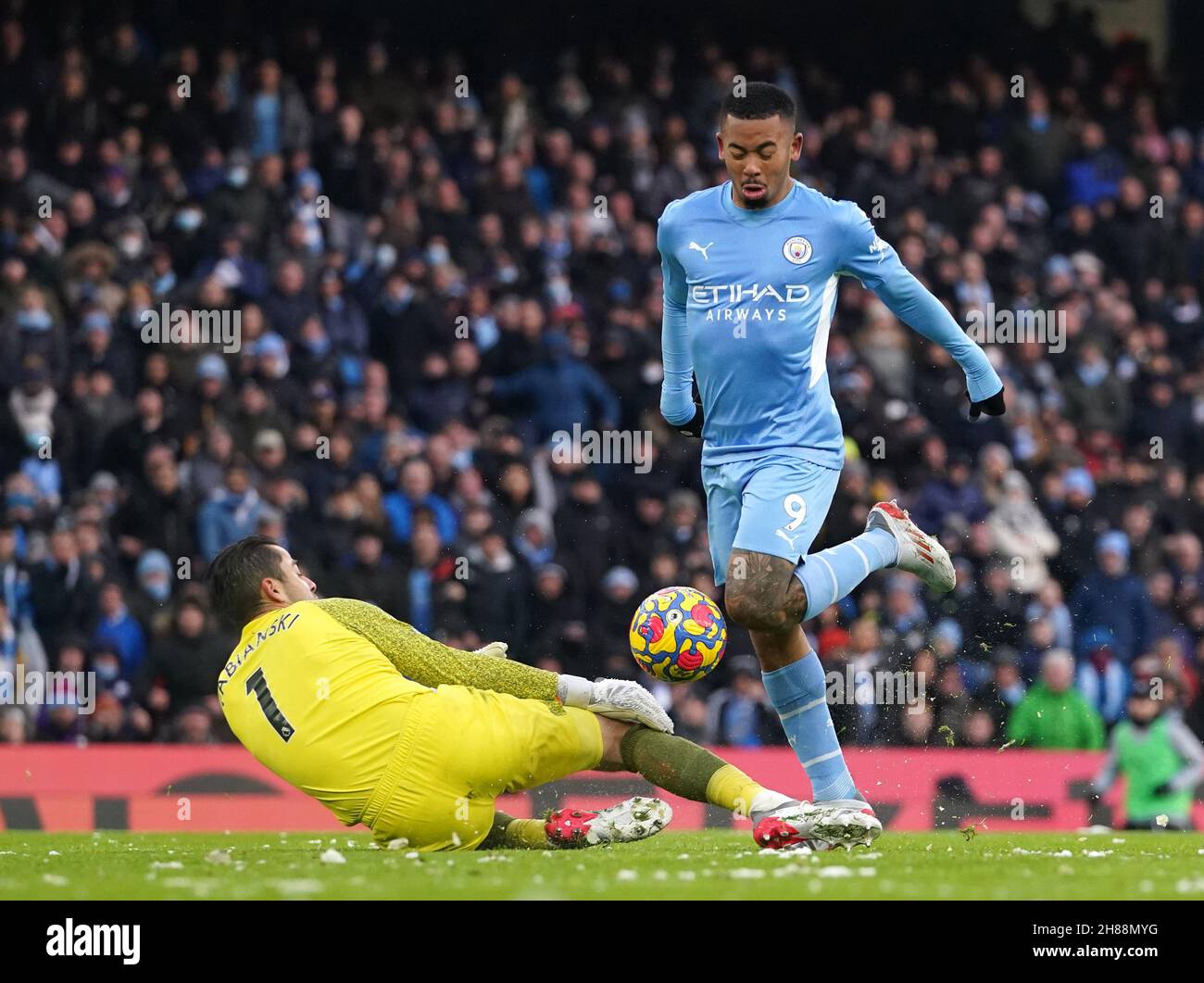 Manchester City's Gabriel Jesus (right) attempts a shot on goal during ...