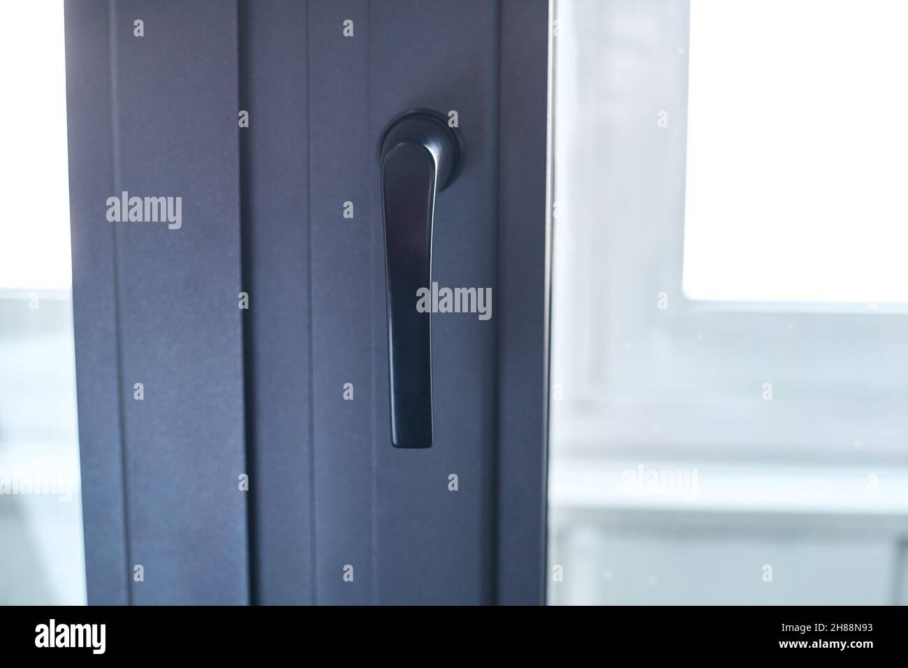 close-up. handle on the balcony window frame Stock Photo - Alamy