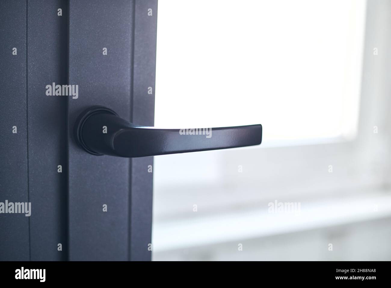 close-up. handle on the balcony window frame Stock Photo - Alamy