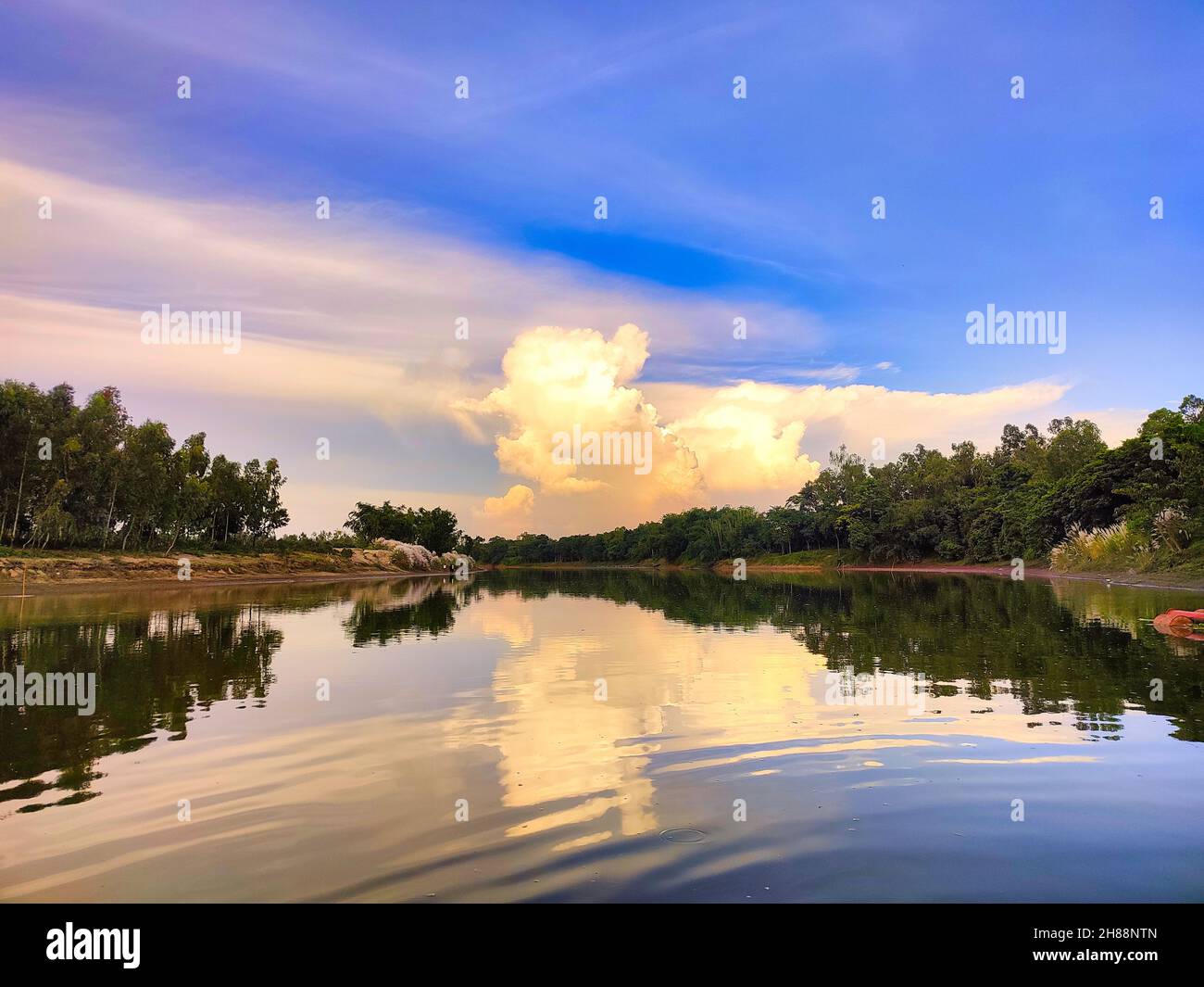 River landscape with blue sky in Asia.Beauty of reflection Stock Photo ...