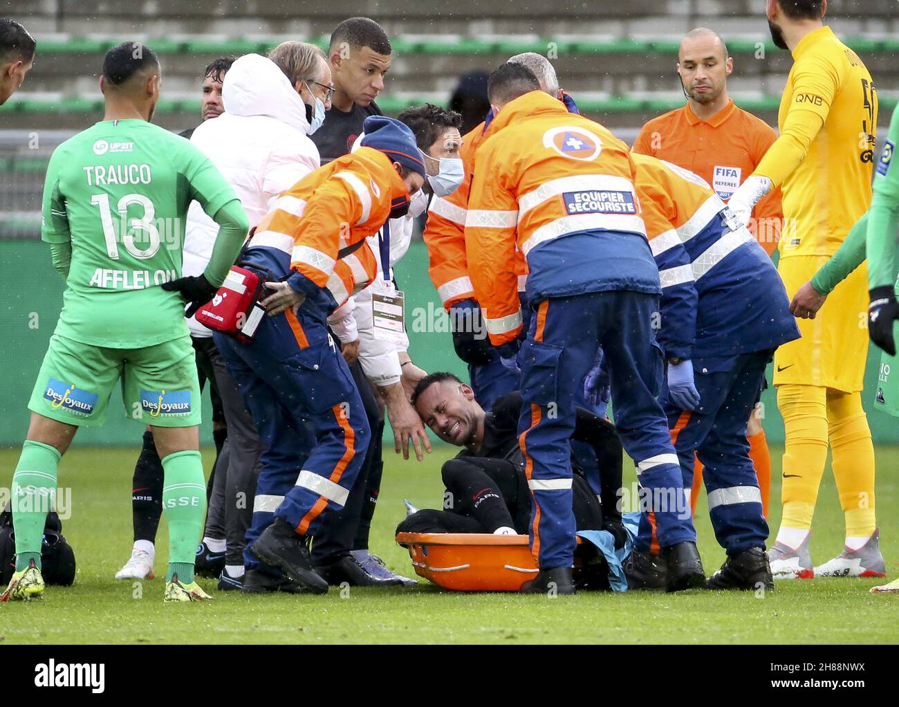 Stretcher on football pitch hi-res stock photography and images - Alamy