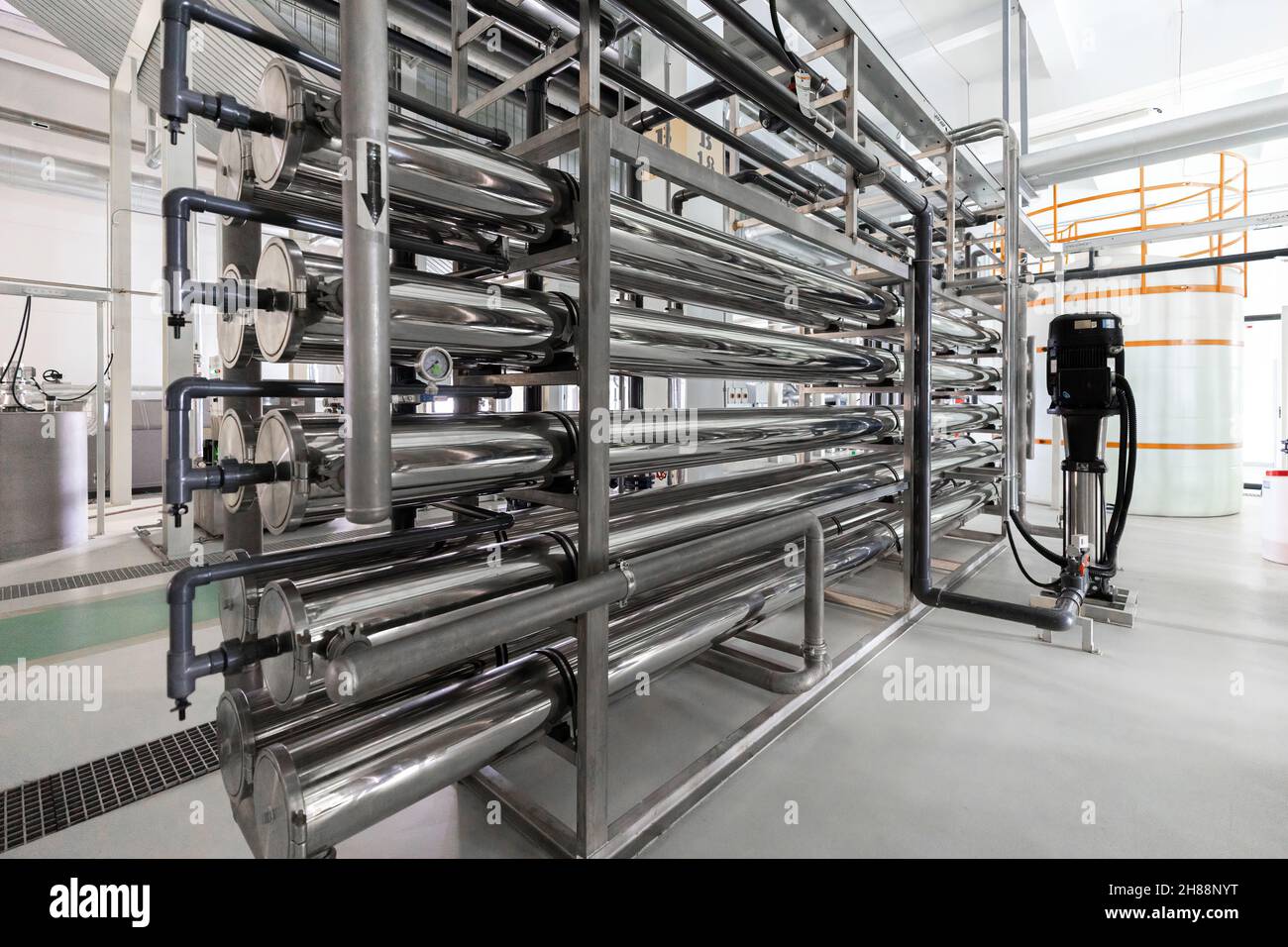 Photo of grey metal pipes and tanks. Chemistry and medicine production ...